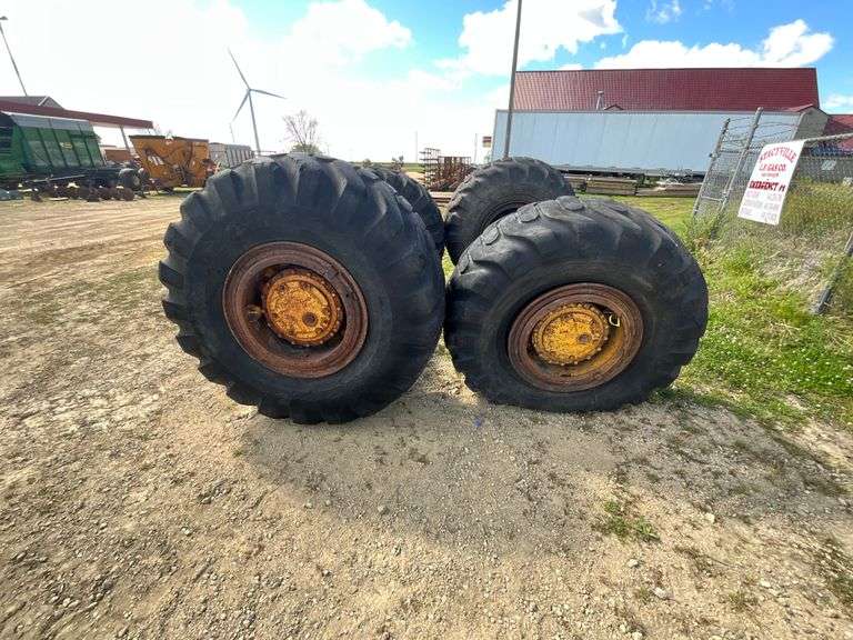Cat 966 loader axles & tires - Hamilton-Maring Auction Group