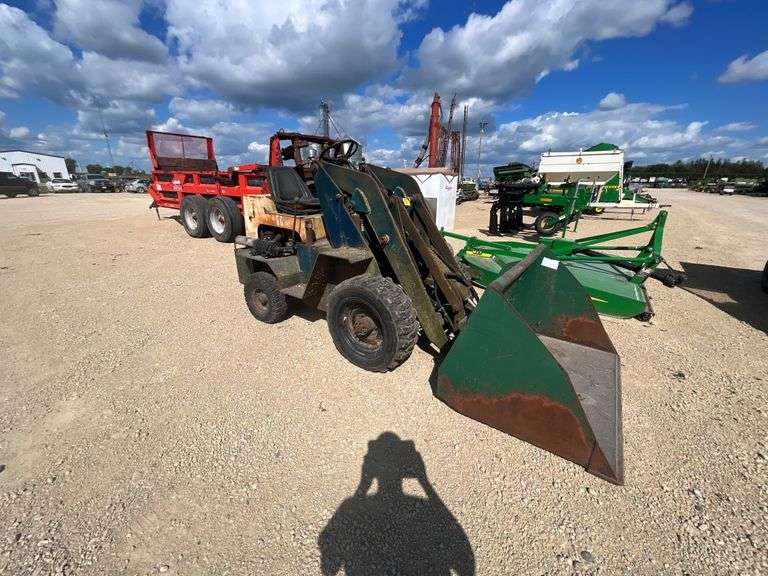 Small gas payloader, 54" bucket, new drive tires/new battery; runs ...