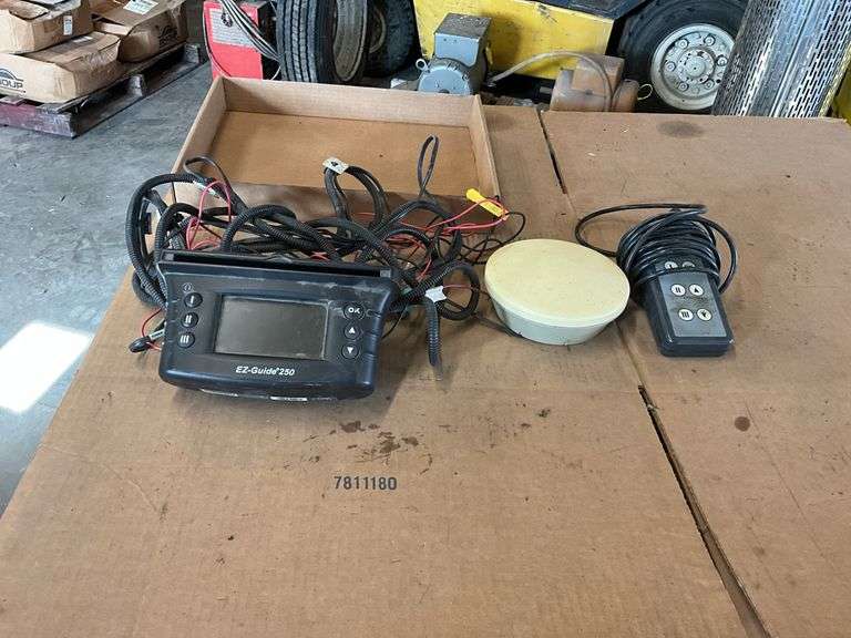 Flat of Trimble guidance system parts - Hamilton-Maring Auction Group