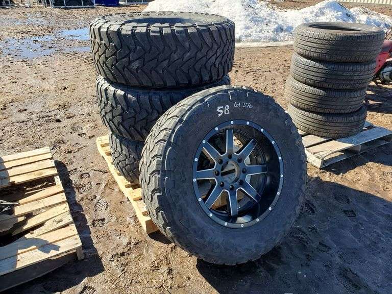 (4) Truck Tires & Rims - Adam Marshall Land & Auction, LLC