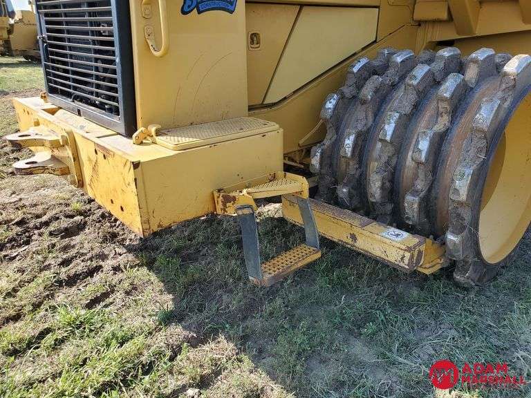 1998 Caterpillar 815F Soil Compactor - Adam Marshall Land & Auction, LLC