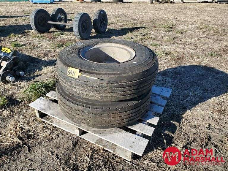 (2) Tires On Split Rims - 8.25R15TR - Adam Marshall Land & Auction, LLC