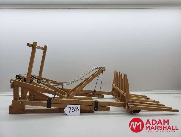 Wooden hay stacker - Adam Marshall Land & Auction, LLC