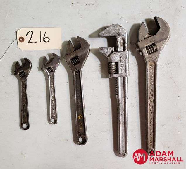 (4) Assorted adjustable wrenches (1) pipe wrench - Adam Marshall Land & Auction, LLC