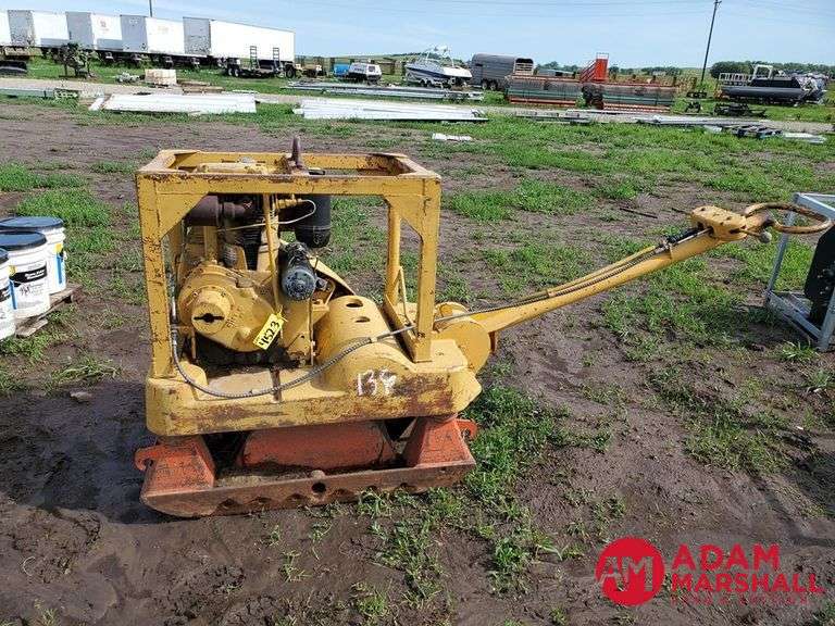 Los Flat Plate Packer - Diesel - Adam Marshall Land & Auction, LLC