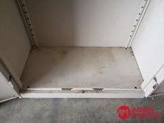 Upright metal cabinet with adjustable shelving. Locking doors with key ...