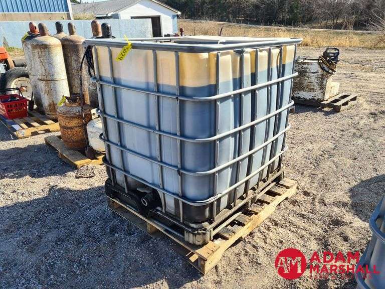 1,000 Gallon IBC Tote Container with Metal Cage and Spigot - Adam ...