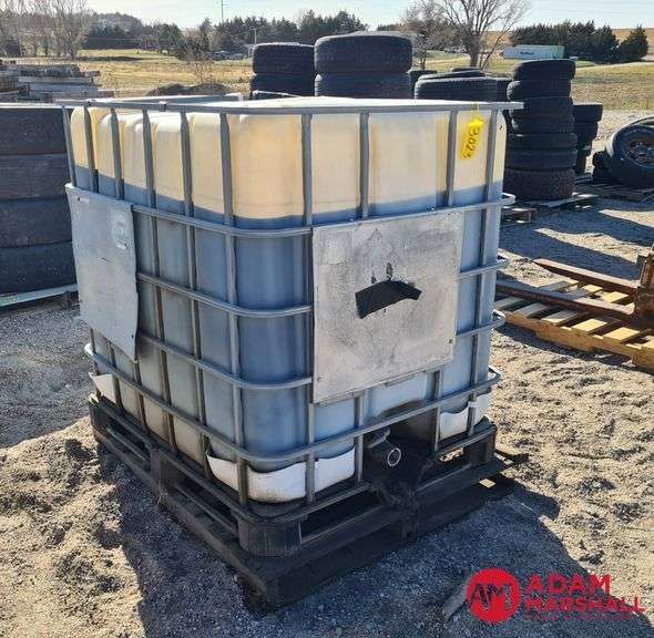 1,000 Gallon IBC Tote Container with Metal Cage and Spigot - Adam ...