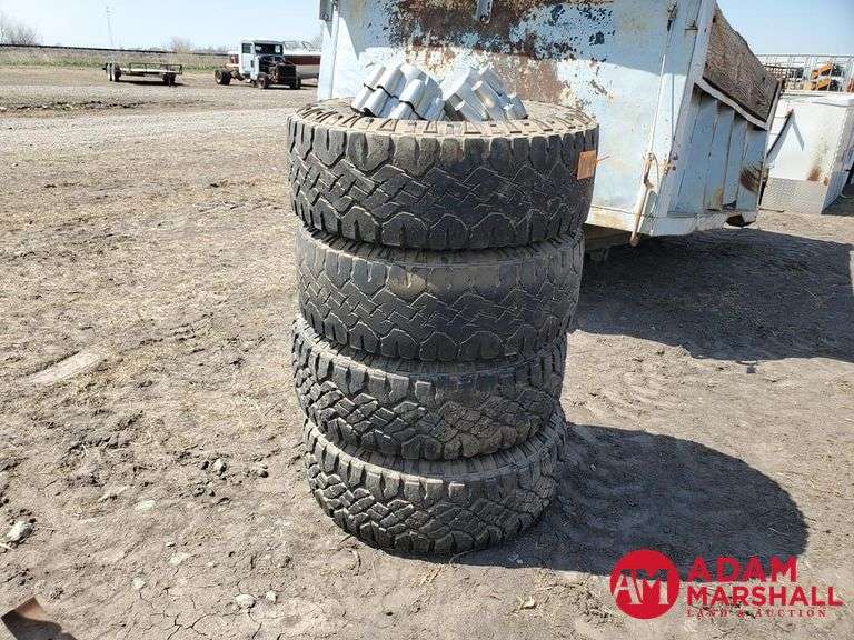 (4) Tires On Rims w/ Hubs - Adam Marshall Land & Auction, LLC