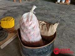 Assorted Rebar Safety Caps in Barrel - Adam Marshall Land & Auction, LLC