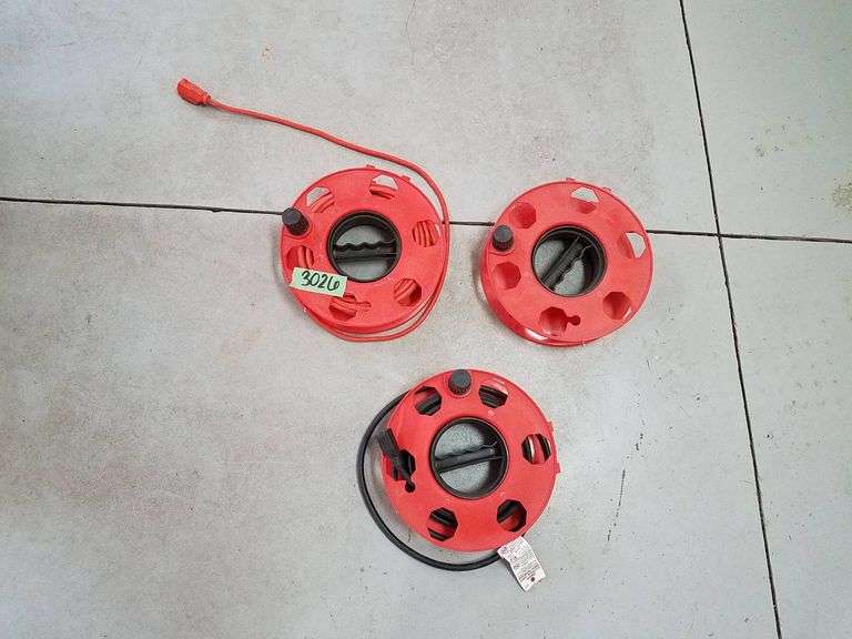 Three Red Plastic Cord Reels with Built-in Handles - Adam Marshall Land ...