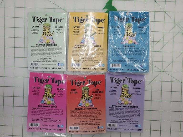 Tiger Tape - Marquette Auction Services