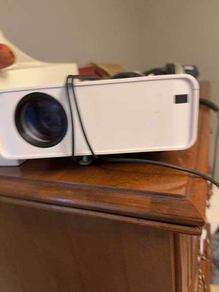 Projector, Headphones - Marquette Auction Services