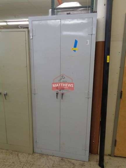 1 EACH-2 DOOR STORAGE CABINET - Matthews Auctioneers