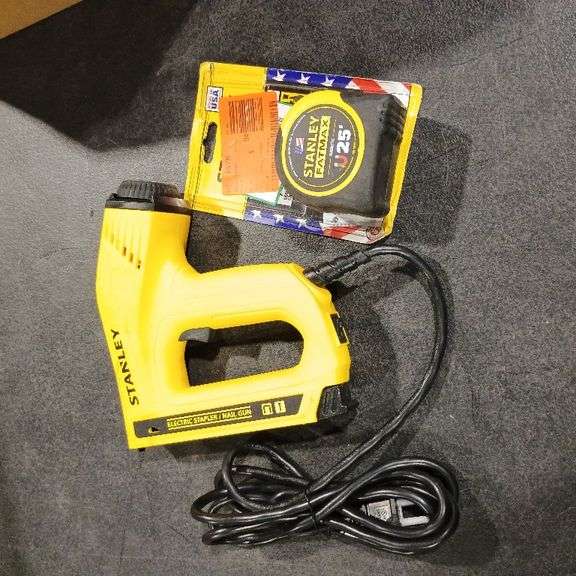 Stanley electric stapler & fat max tape measure - Matthews Auctioneers