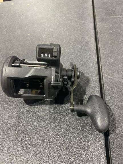 Bass pro depth master reel model 30 w/line counter - Matthews Auctioneers