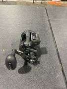 Bass pro depth master reel model 30 w/line counter - Matthews Auctioneers