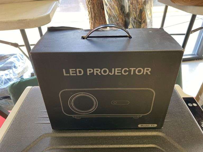 LED Projector, Model F1 - Matthews Auctioneers