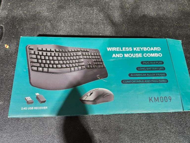 Unknown wireless keyboard and mouse - Matthews Auctioneers