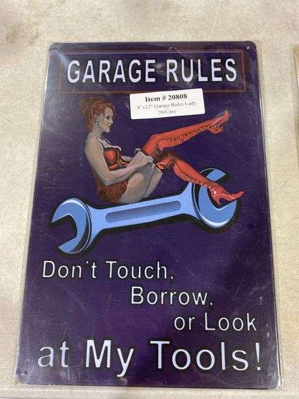 8 in x 12 in Garage Rules Lady Metal Sign - Matthews Auctioneers