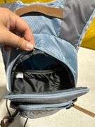 Bass Pro Shop backpack with container - Matthews Auctioneers