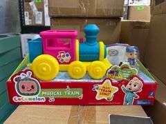 CoComelon Official Feature Musical Train - Matthews Auctioneers