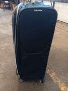 Swiss tech suitcase - Matthews Auctioneers