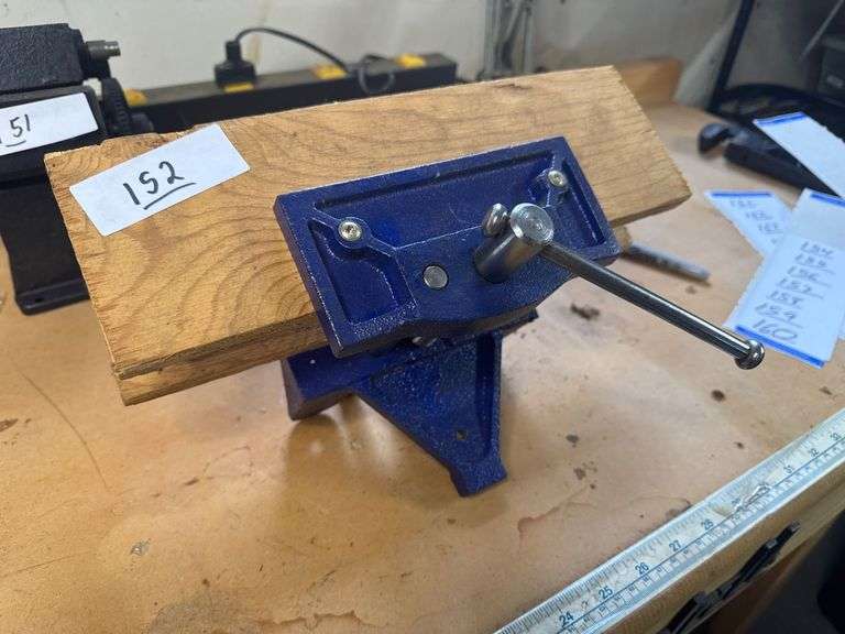 Blue Cast Iron Bench Vise with Wood Jaws - Matthews Auctioneers