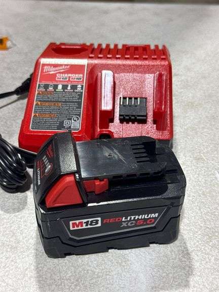 Milwaukee Red Lithium XC 5.0 Battery with Charger - Matthews Auctioneers