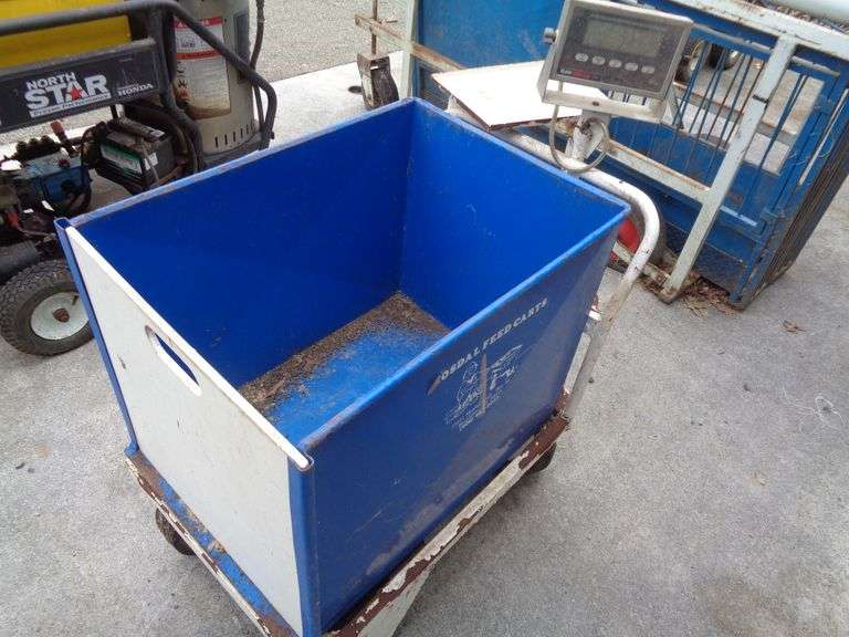 1 -MOSDAL FEED CART - Matthews Auctioneers