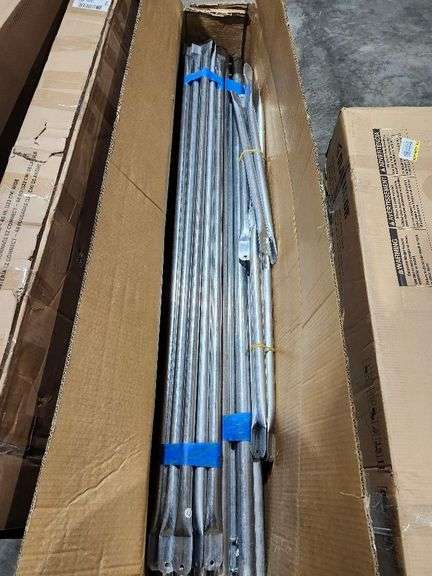 Two boxes of unknown party tent - Matthews Auctioneers