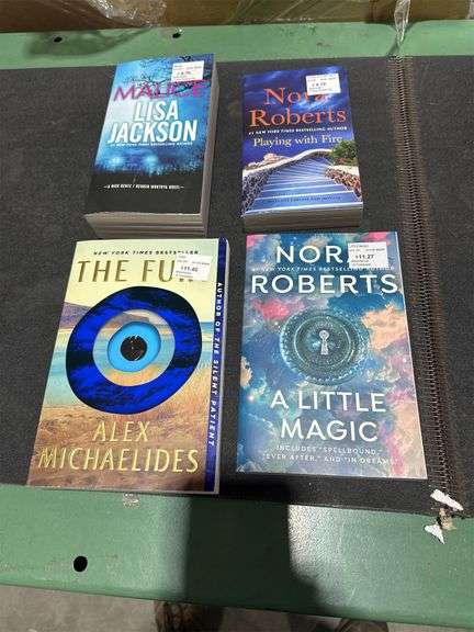 (4) Paperback Books - Matthews Auctioneers