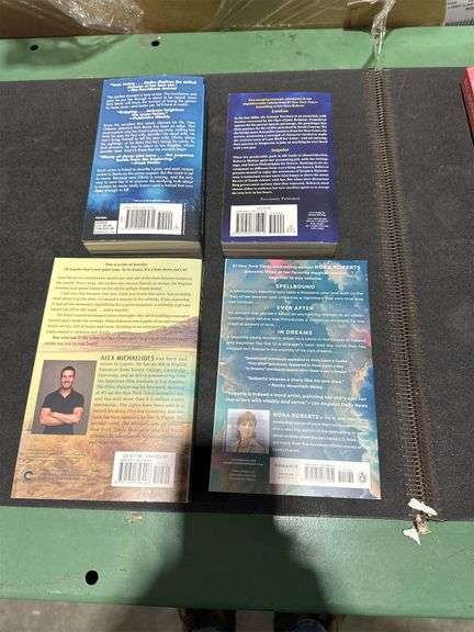 (4) Paperback Books - Matthews Auctioneers