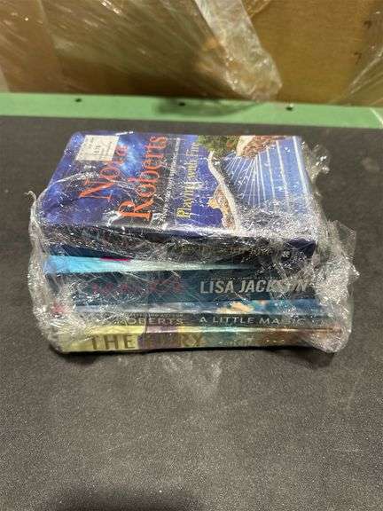 (4) Paperback Books - Matthews Auctioneers