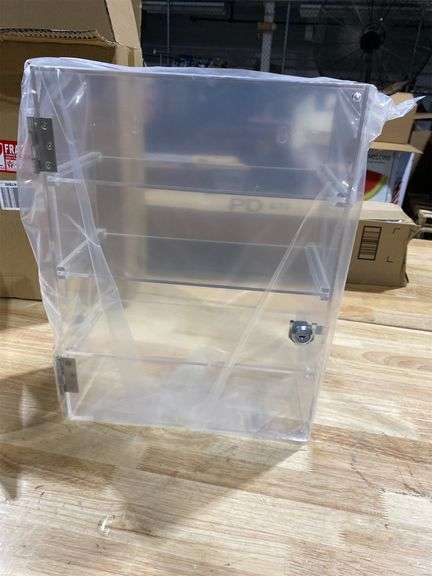 Plastic display case with lock and key - Matthews Auctioneers