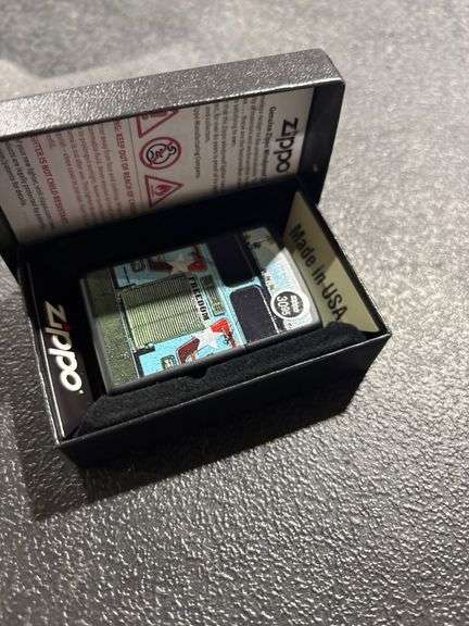 Zippo Lighter - Matthews Auctioneers