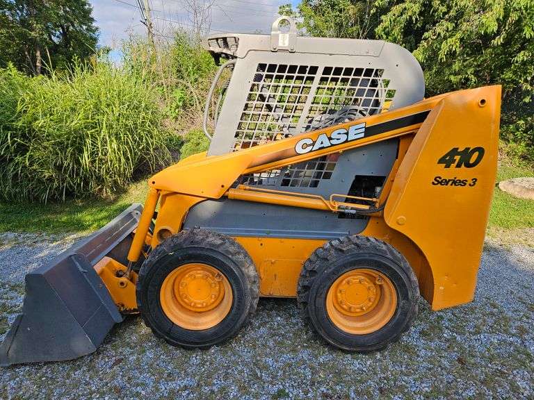 Case 410 skidsteer - Matthews Auctioneers