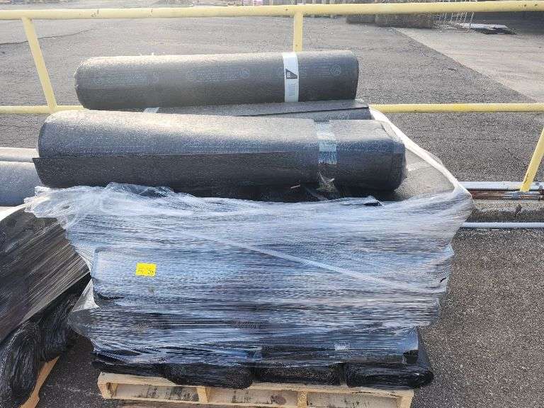 Pallet of 24 rolls of white roofing material - Matthews Auctioneers