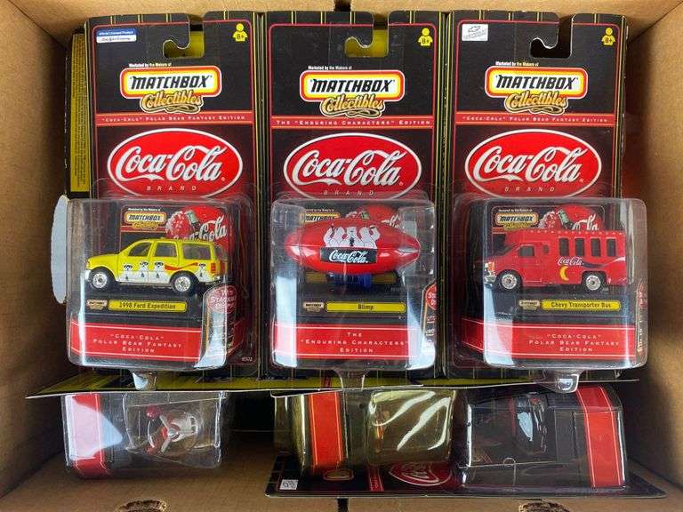 Group of assorted Matchbox Collectibles Coca-Cola die-cast vehicles ...