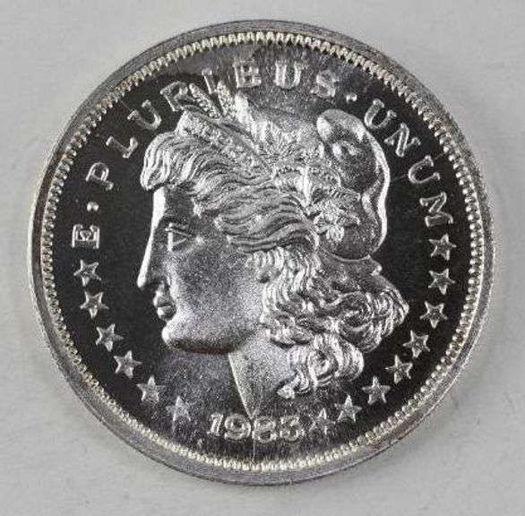 1983 Morgan/Scale 1oz. .999 Fine Silver - Matthew Bullock Auctioneers