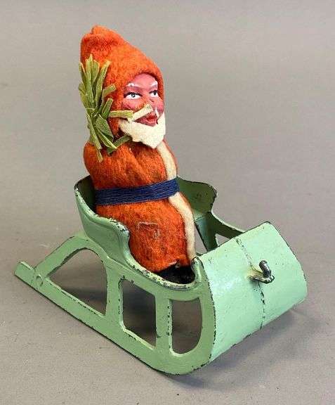 Vintage German Painted Santa Claus and Sled - Matthew Bullock Auctioneers