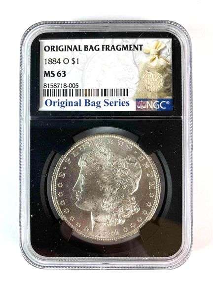 Original Bag Fragment 1884-O NGC Graded MS 63 US Morgan Silver Dollar - Matthew Bullock Auctioneers