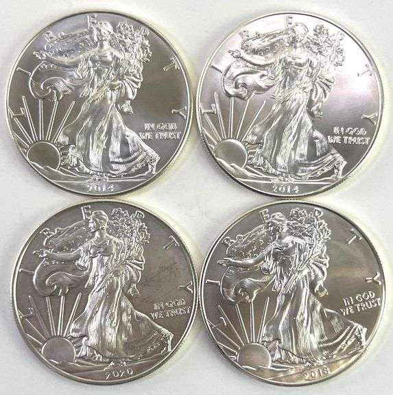 Group of 4 US Mint Silver American Eagles 1 oz .999 Fine Silver - Matthew Bullock Auctioneers