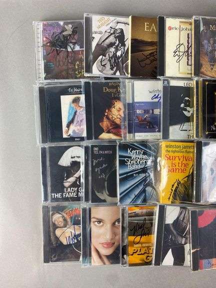 Group of 20+ Assorted Signed CDs - Matthew Bullock Auctioneers