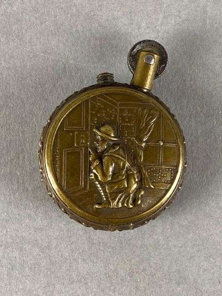 Vintage Brass Peeping Tom Lighter - Matthew Bullock Auctioneers