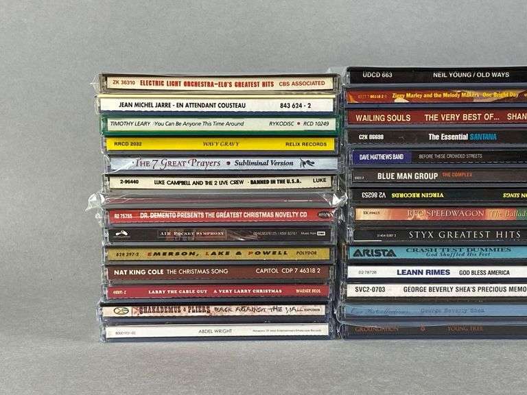 Group of 30+ Iconic Artist CDs and More - Matthew Bullock Auctioneers