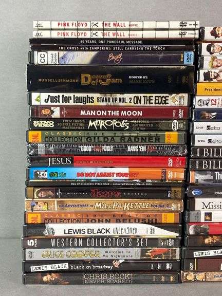 Group of 50+ Assorted DVDs and VHS Tapes - Matthew Bullock Auctioneers