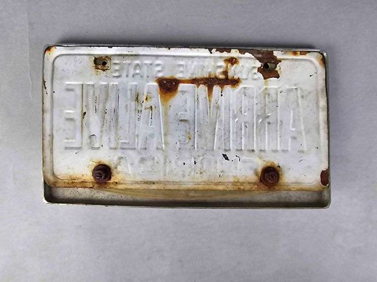 Florida Arrive Alive License Plate - Matthew Bullock Auctioneers