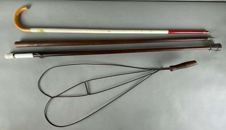 Group of 4 Canes and Rug Beater - Matthew Bullock Auctioneers
