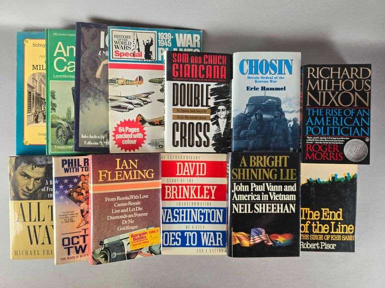 Group of 13 Military Books and More - Matthew Bullock Auctioneers